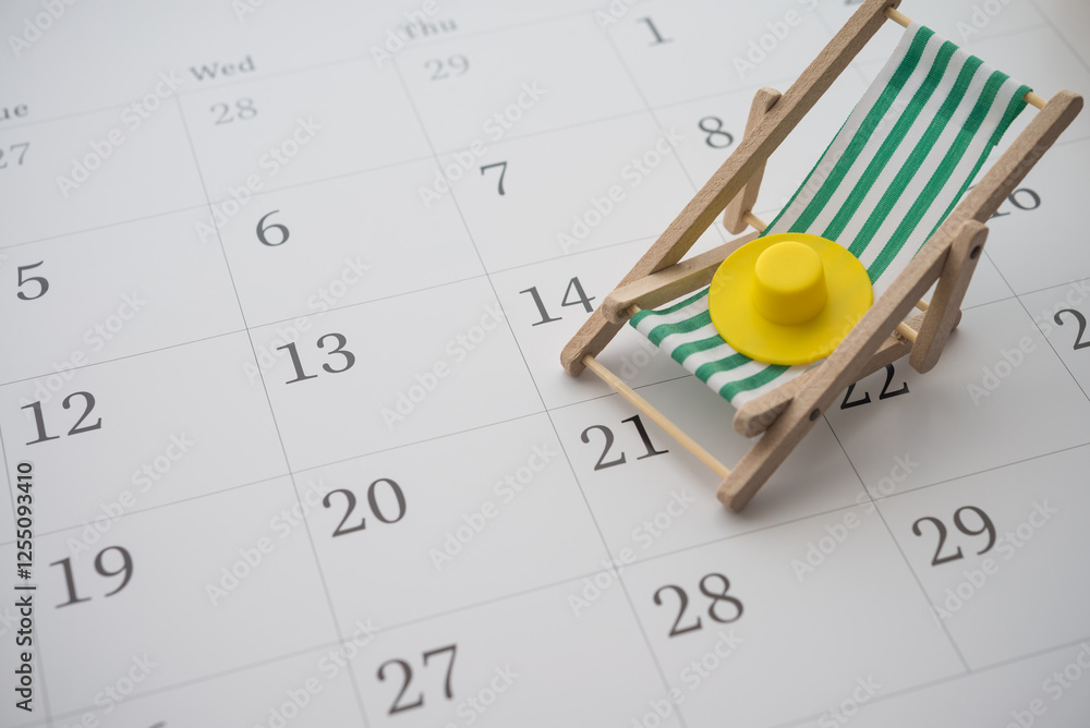 Green beach chair and hat on white blank calendar background copy space ...