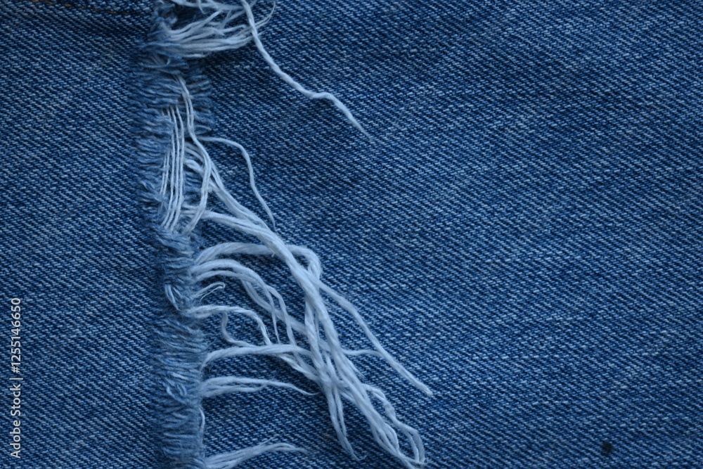 torn light grey denim surface, denim fringe , hole macro texture of ...
