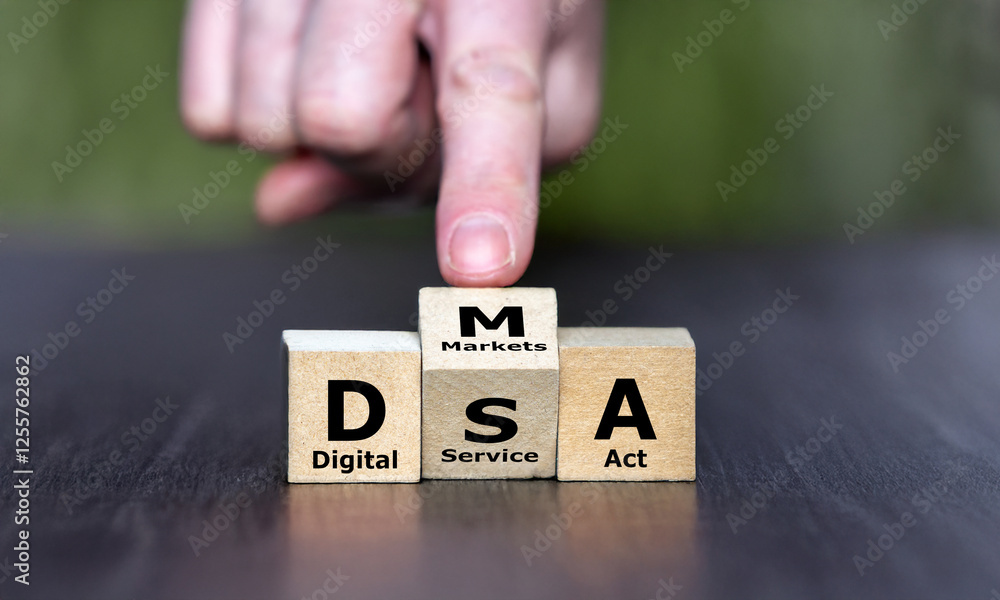 Cubes form the abbreviations DSA (Digital Services Act) and DMA ...