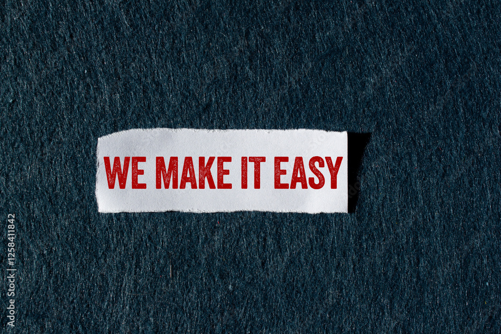 We make it easy message written on ripped torn paper piece with gray ...