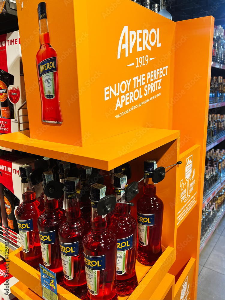 Kyiv, Ukraine - February 11, 2025: Bright display of Aperol bottles in ...