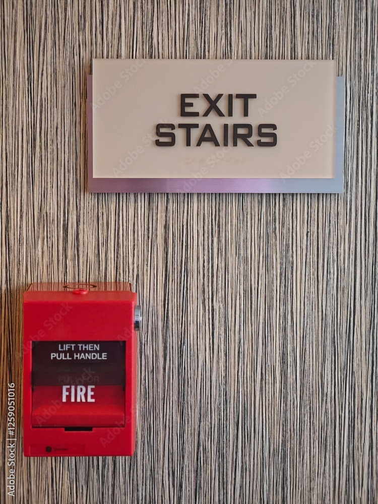 Emergency exit signage and fire alarm box guide safety in a modern ...
