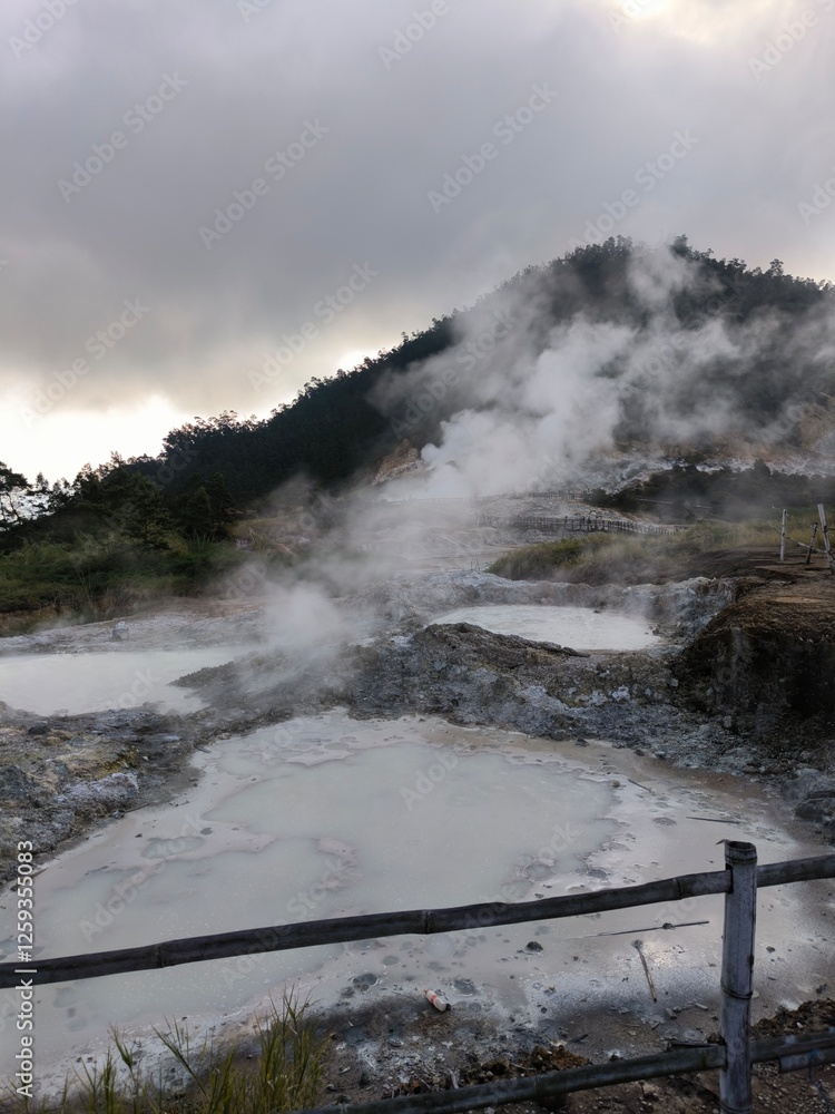 Sikidang Crater with its thick sulfur steam is a quite famous tourist ...