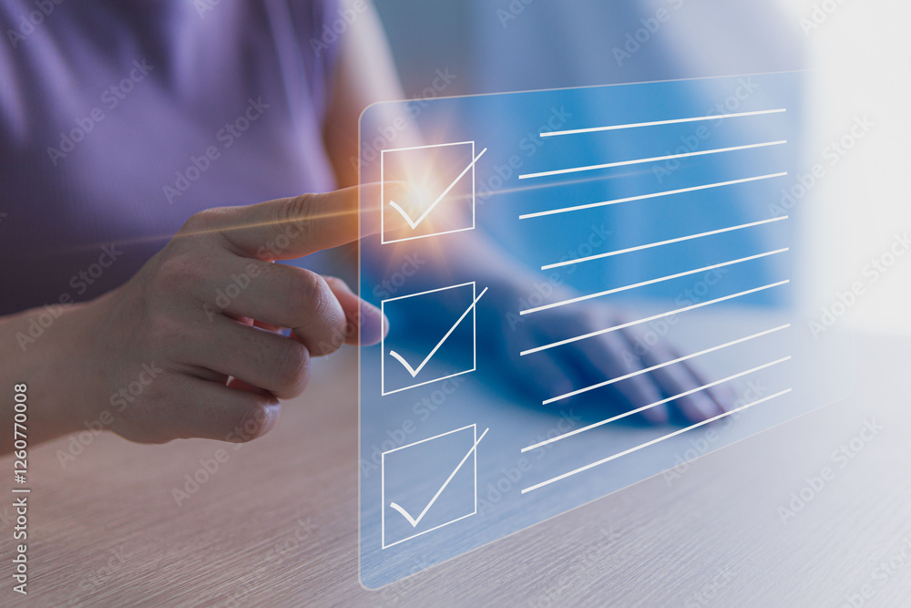 Businesswoman pointing at square box with check mark on virtual check ...