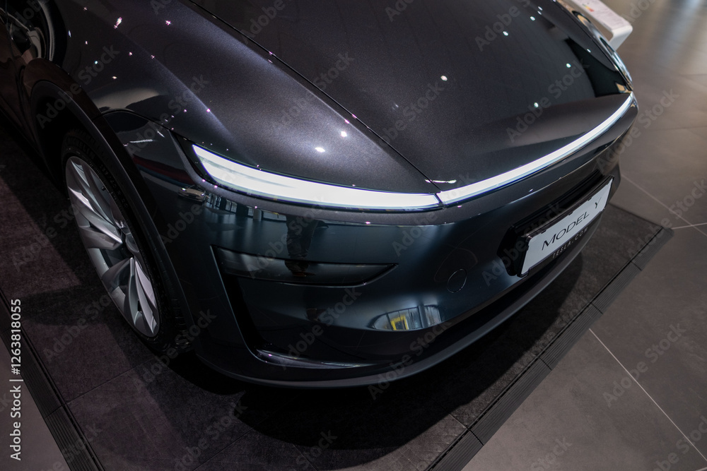 new Tesla Model Y Juniper glossy finish, standing in showroom, advanced ...