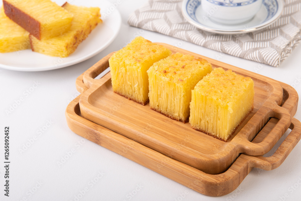 Bika ambon or kuih bingka, a traditional Indonesian snack, which has a ...
