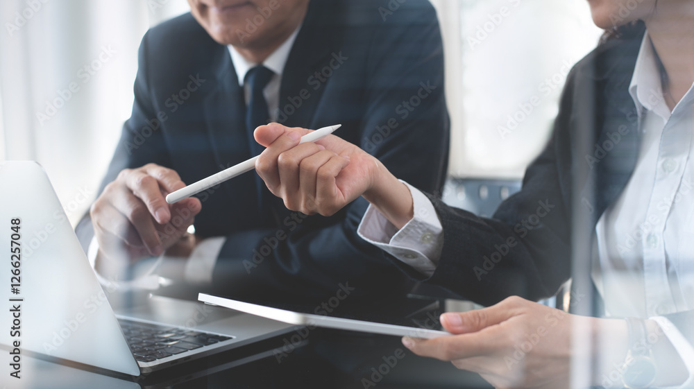 Co-working team brainstorming in modern office. Asian business ...