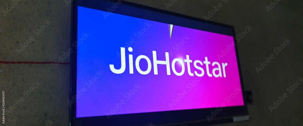 New Delhi, India - February 15 2025. Jio hotstar app icon on LCD tv ...
