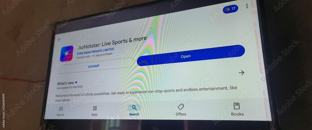 New Delhi, India - February 15 2025. Jio hotstar app icon on LCD tv ...