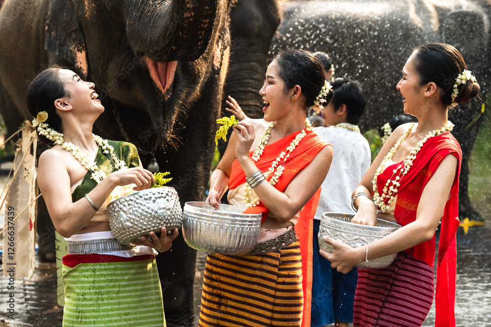 Thai women in traditional clothing holding silver bowl celebrating songkran in chiangmai Stock ...