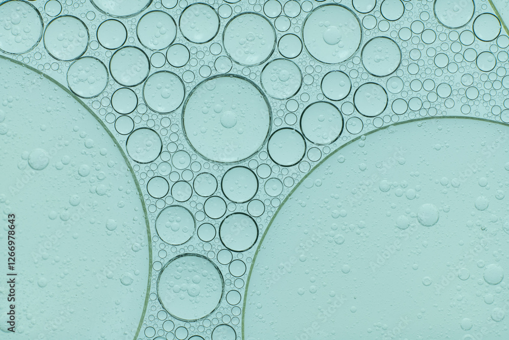 Macro microscope green bubble texture, Close-up Green bubbles and drops oil background . blue ...