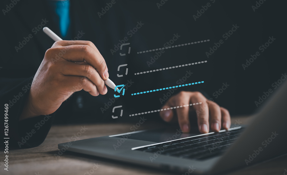 businessman uses a laptop to manage tasks with Document Management System (DMS), filling out ...