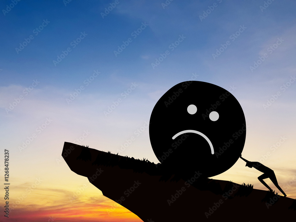 Controlling stress, businessman pushes sad face to keep from falling ...