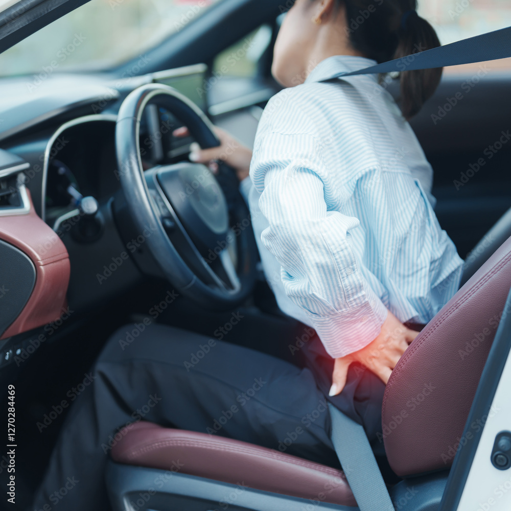 woman with her back sprain while driving car long time, back body ache ...