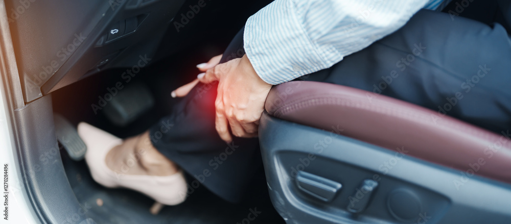 woman with her calf leg sprain while driving car long time ...