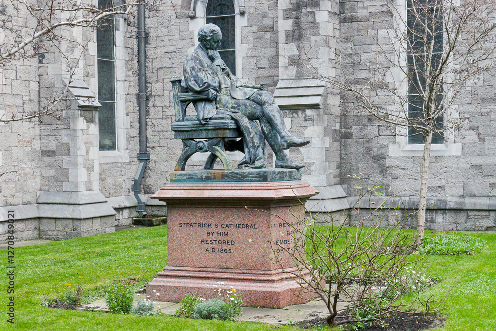 DUBLIN, IRELAND - JANUARY 22, 2025: Statue of Benjamin Guinness in front of St Patrick's ...