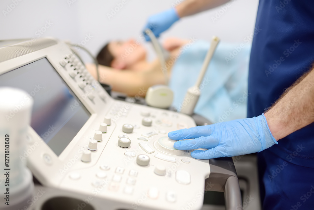 Mammologist doctor examines a woman breasts and lymph nodes using ...