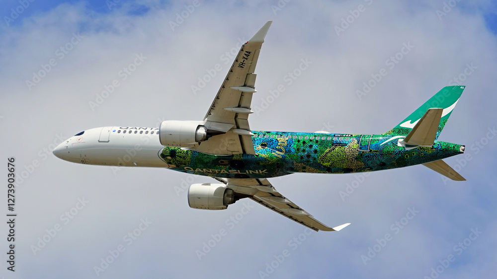 Qantas Aboriginal livery plane landing at Melbourne Airport in ...