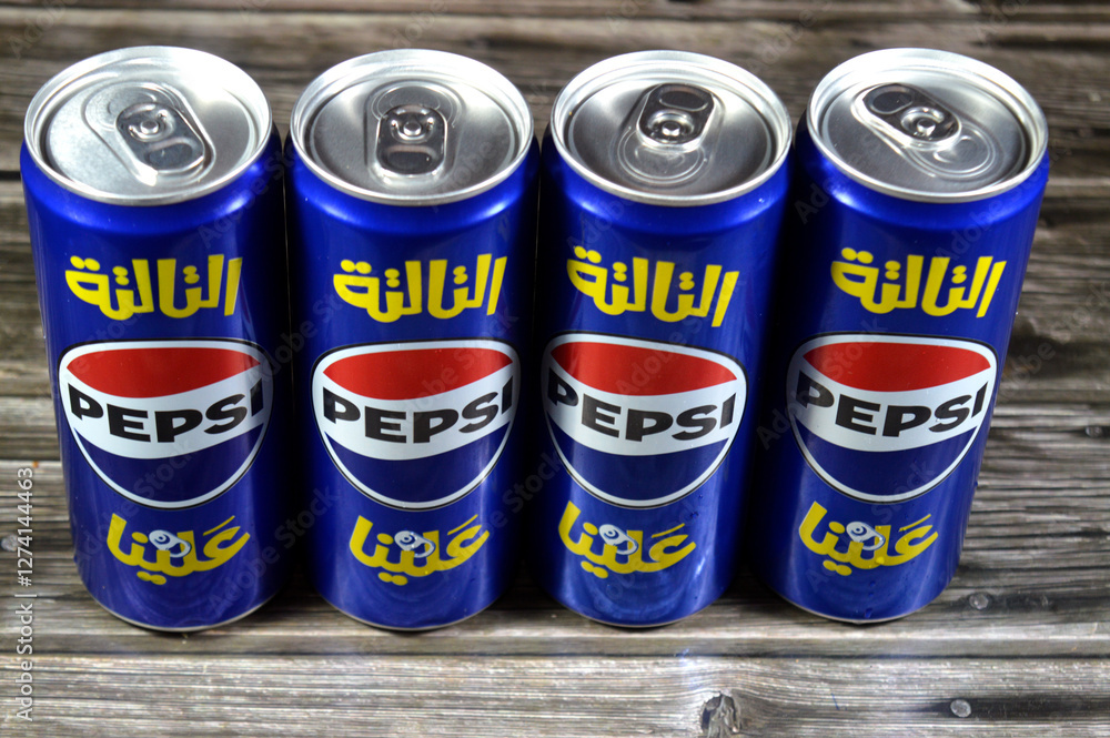 Cairo, Egypt, February 8 2025: Pepsi on a wood background, Cola flavor ...