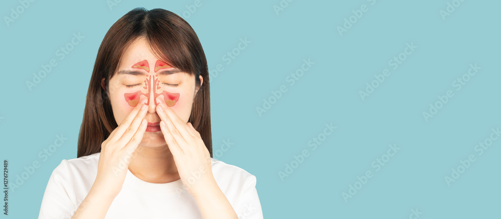 Asian woman suffering from sinusitis with nasal congestion of mucus or ...