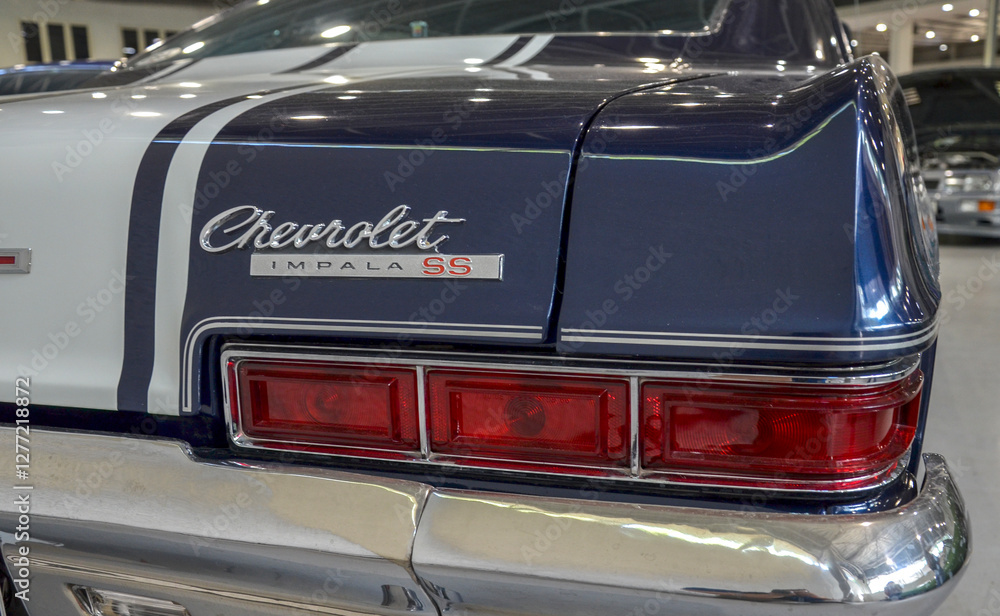 Rear end of a classic Chevrolet Impala SS with iconic emblem is ...