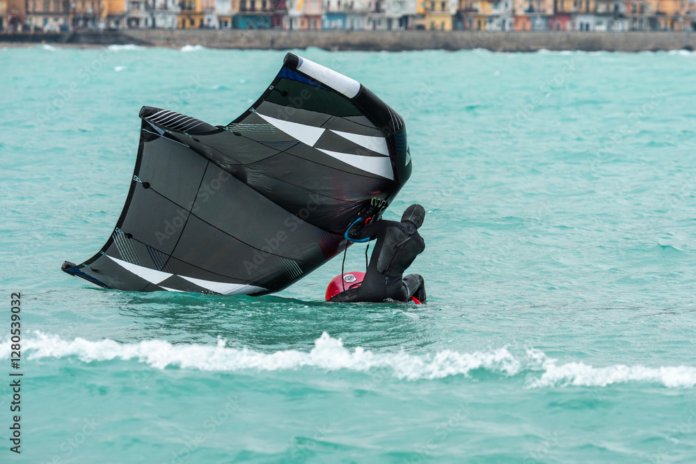 Wingfoil is a sport combining kitesurfing and windsurfing. Moment of ...