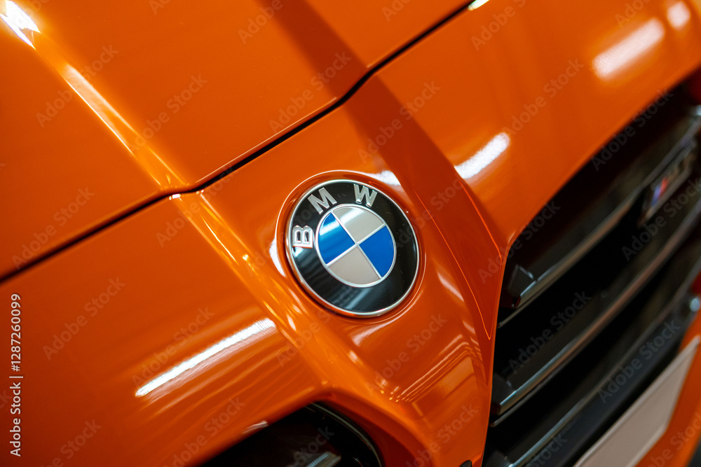Luxurious orange BMW M4 Competition G82 Coupe, aerodynamic design ...