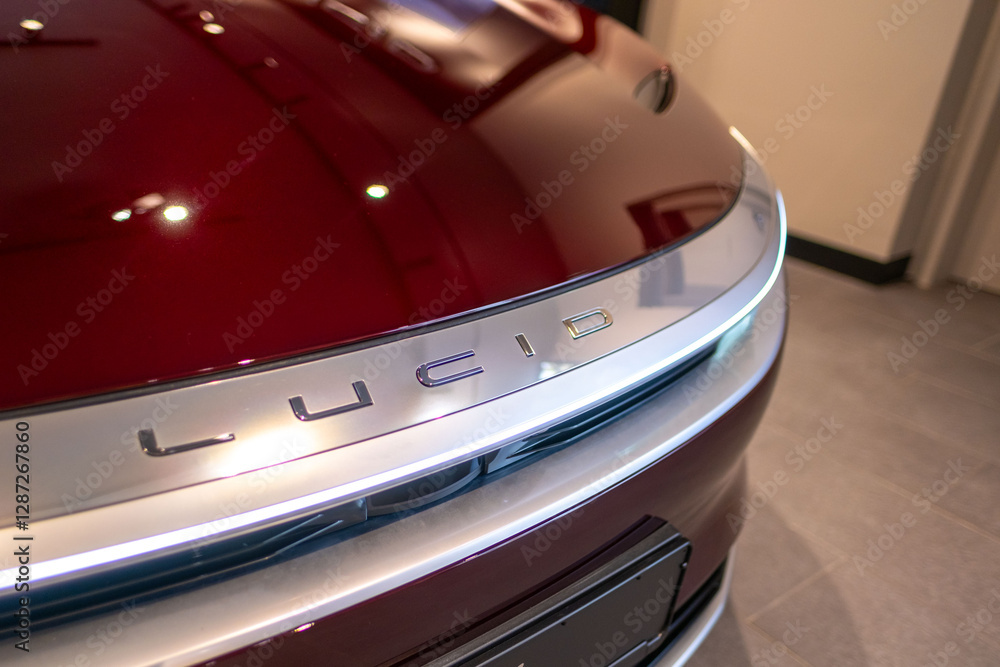 electric Lucid Air showcasing aerodynamic design and distinctive light ...