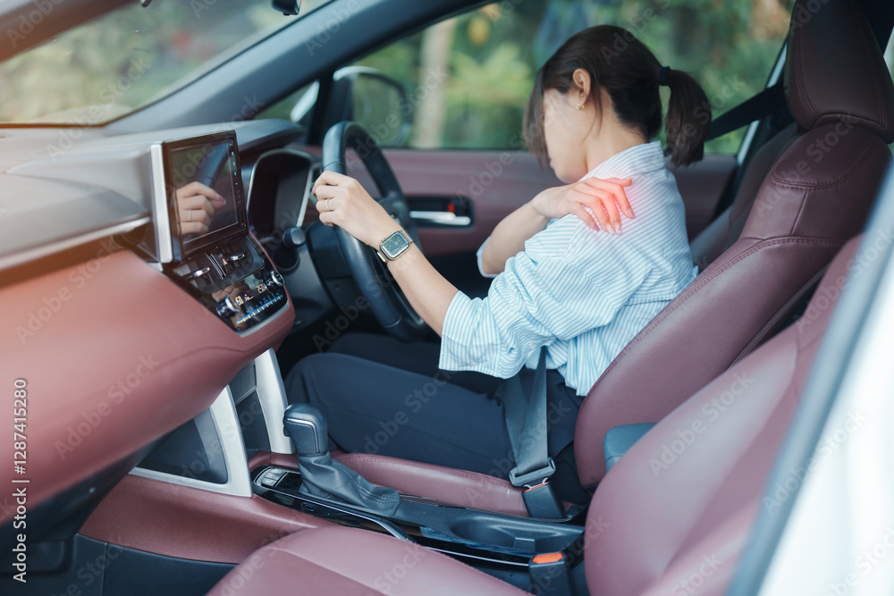 woman with her shoulder and neck sprain while driving car long time ...