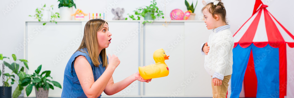 Nonverbal child with Down syndrome learning baby sign language with the ...