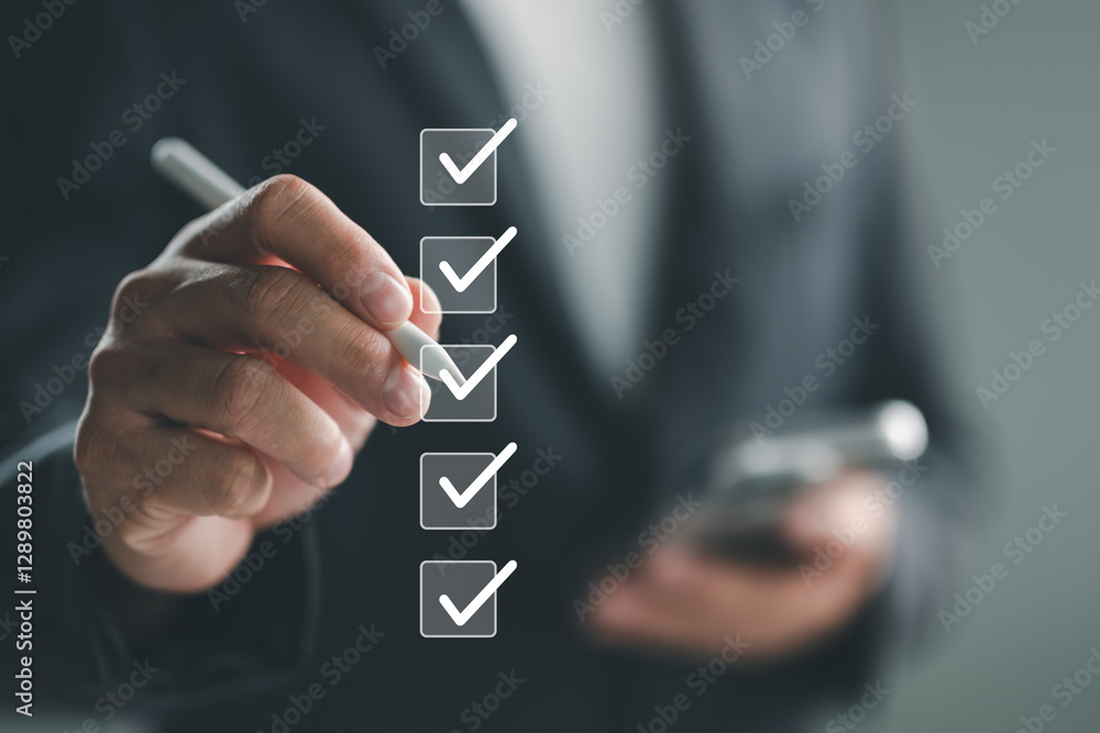 Quality control and check list, Businessman use pen to tick correct ...
