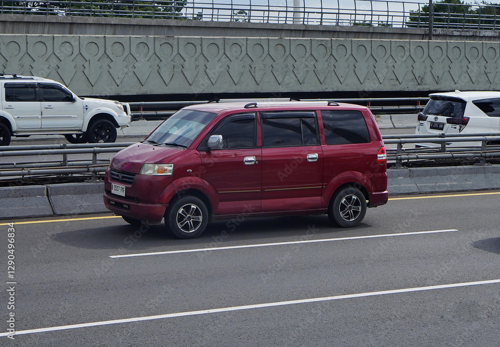 MPV Suzuki APV, Red Maroon color on the highway in Jakarta, Indonesia ...