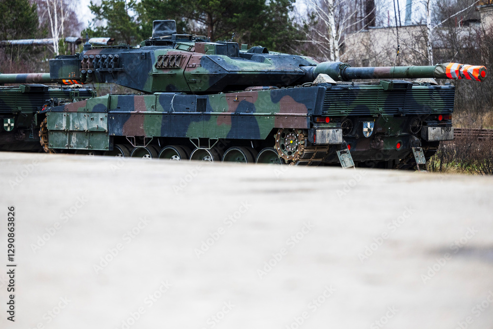 A rear view of a German Leopard 2 main battle tank loaded on a flatbed ...