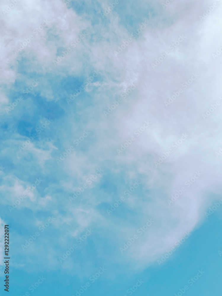 beautiful pleasant background of turquoise sky with white clouds. an ...