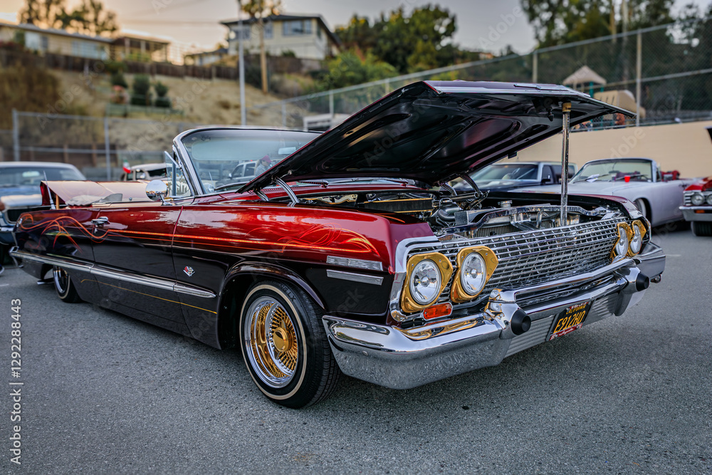 Chevrolet Impala with custom pinstriping, gold wire wheels, California ...