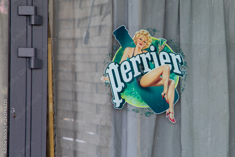Perrier logo brand and text sign window sticker bar shop entrance ...