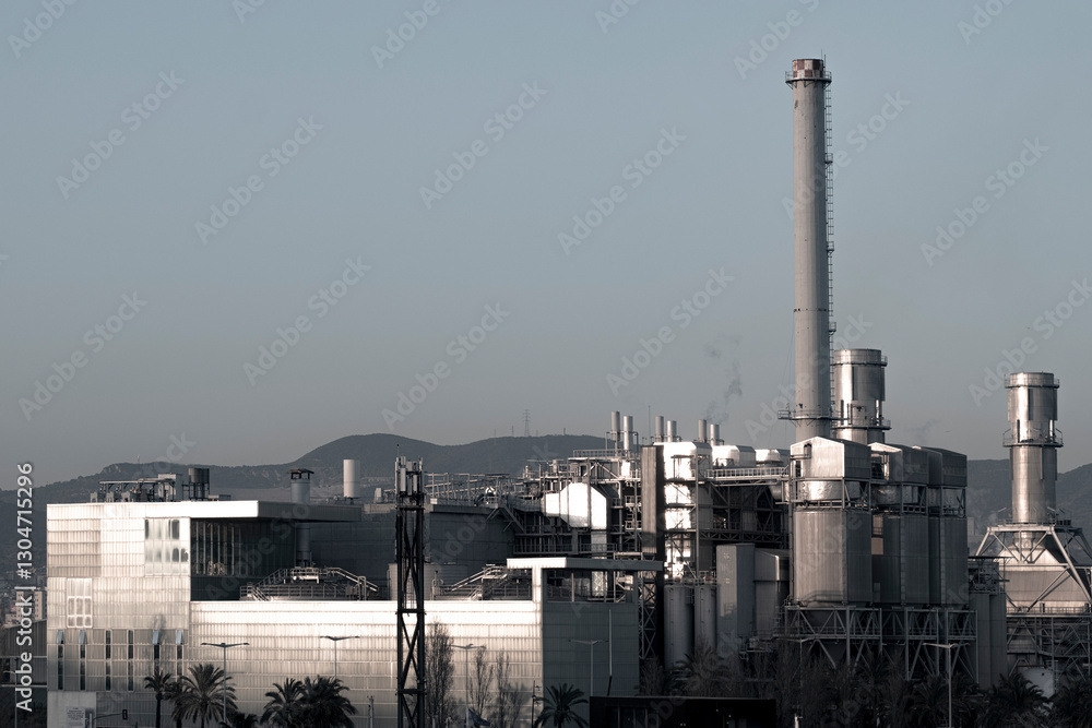 Monochrome industrial landscape with factory buildings and chimneys ...