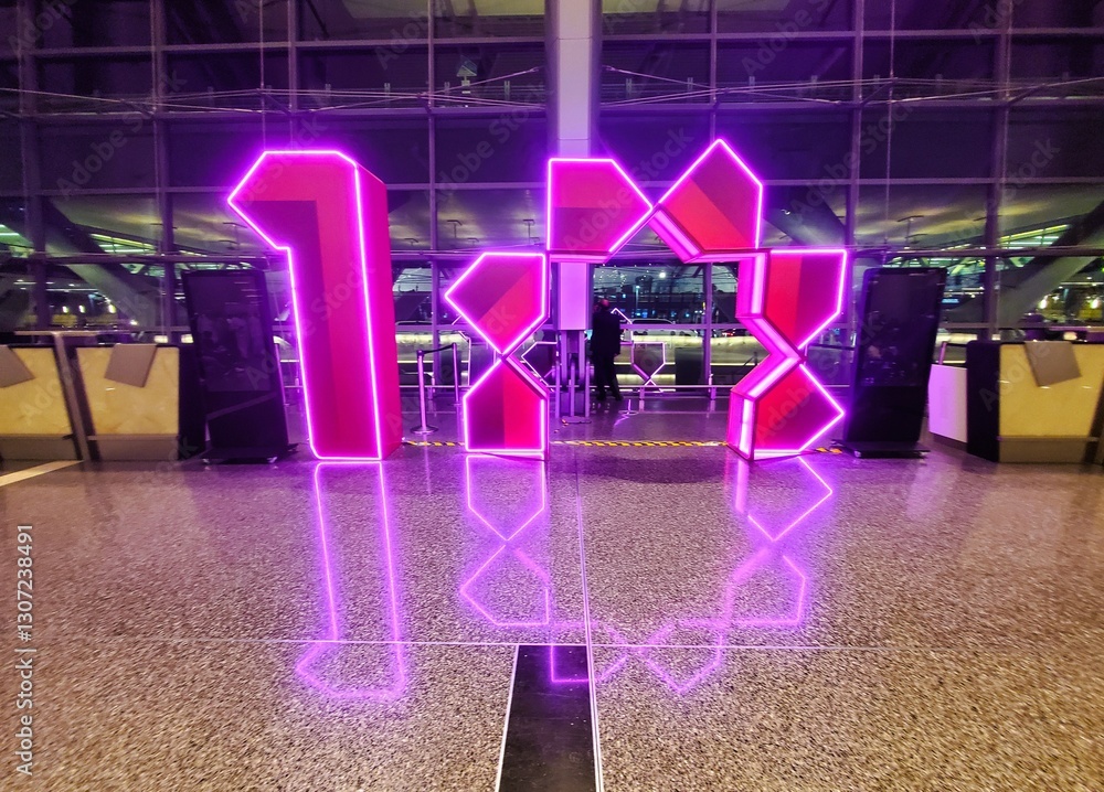 Doha, Qatar - January 18, 2025 - A vibrant, neon-pink sign to celebrate ...