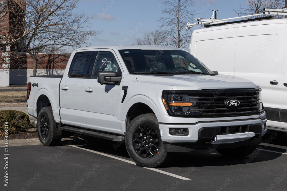 Ford F-150 4X4 Supercrew pickup display at a dealership. Ford offers ...