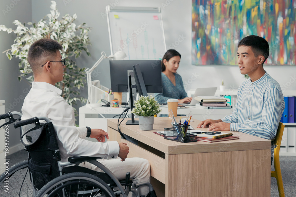 Two men meet in company office morning for interview disabled boy ...