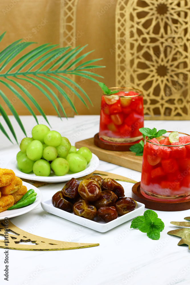 Typical Indonesian iftar menu in ramadan month. Fruit ice, dates fruit ...
