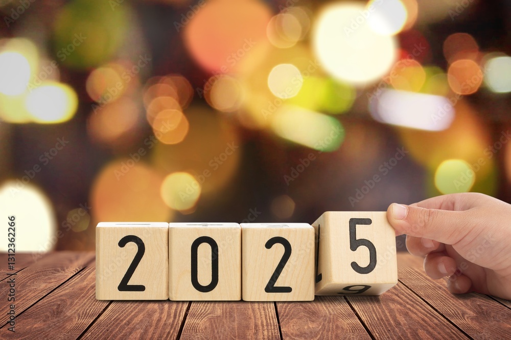 Transitioning to 2025 on wooden cubes, new year concept Stock Photo ...