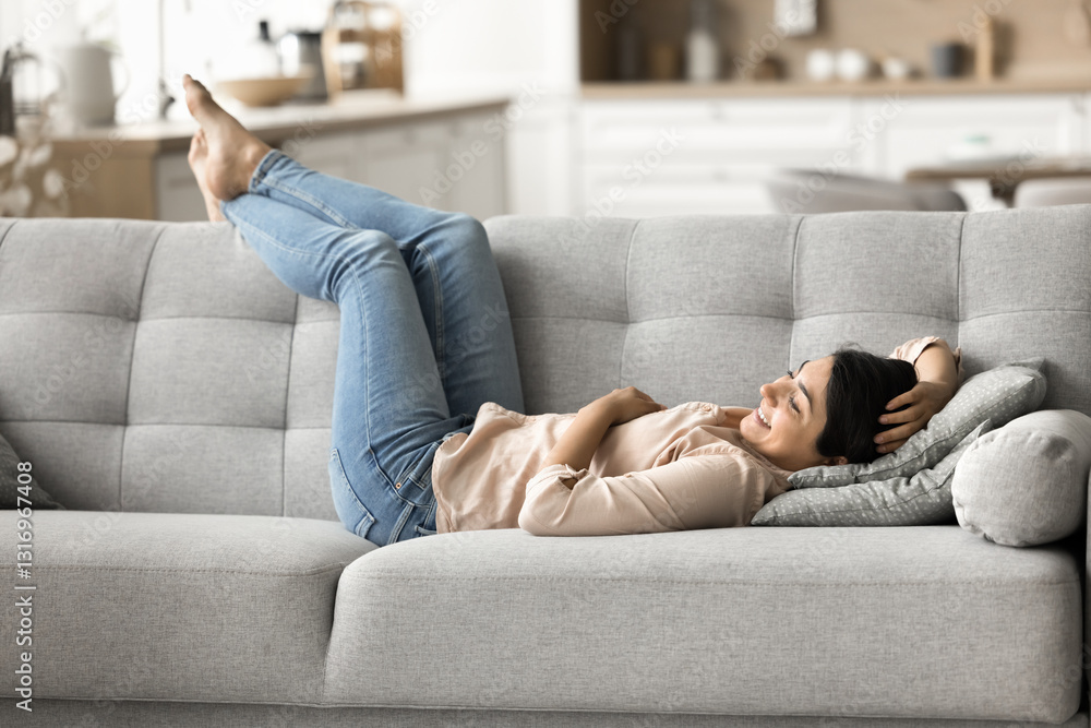 Comfort for myself. Peaceful smiling young girl housewife successful in ...