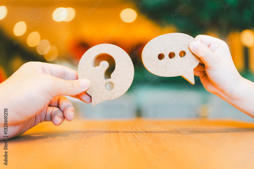 Father's hand holding a question symbol, child's hand holding a ...