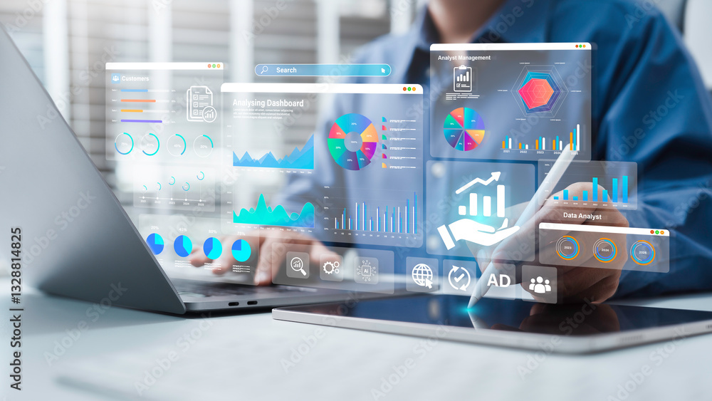An analyst uses a computer and dashboard for data business analysis and ...