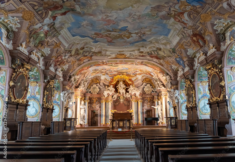 Baroque church interior with stunning frescoed ceiling, golden altar ...