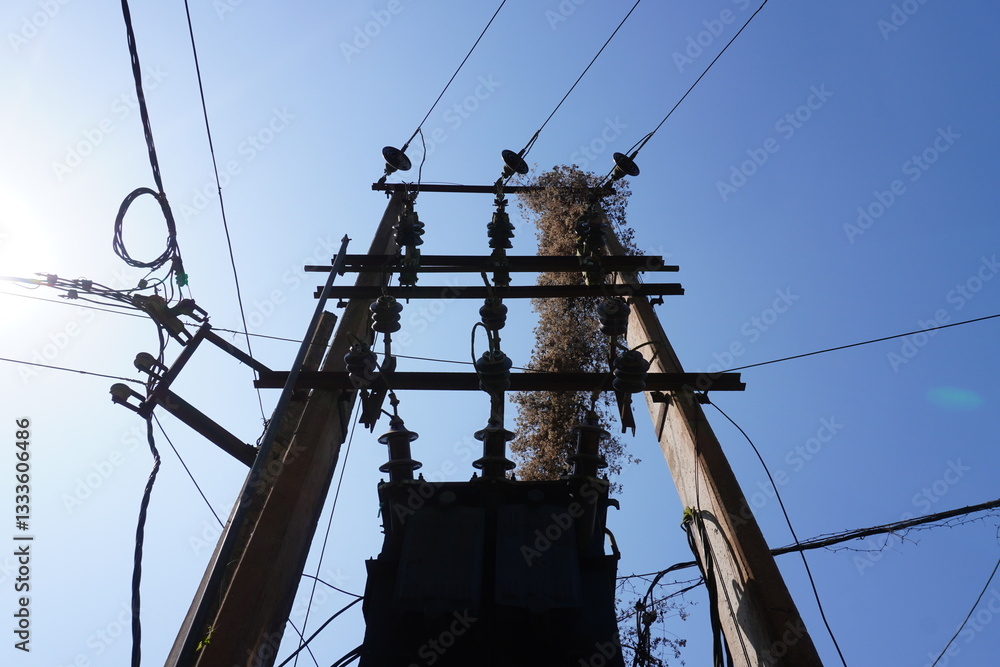 Pole-mounted electrical transformer, which is used to step down high ...