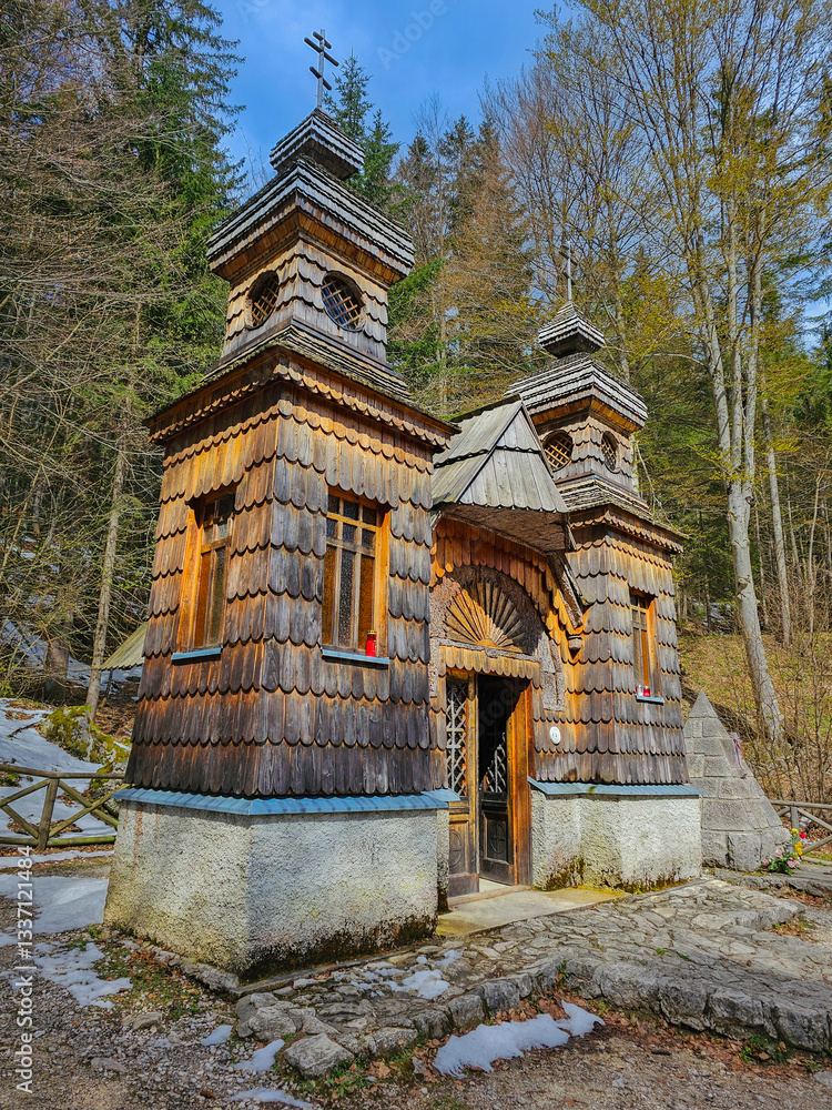 Wooden russian chapel nestling amid alpine trees near vršič pass ...