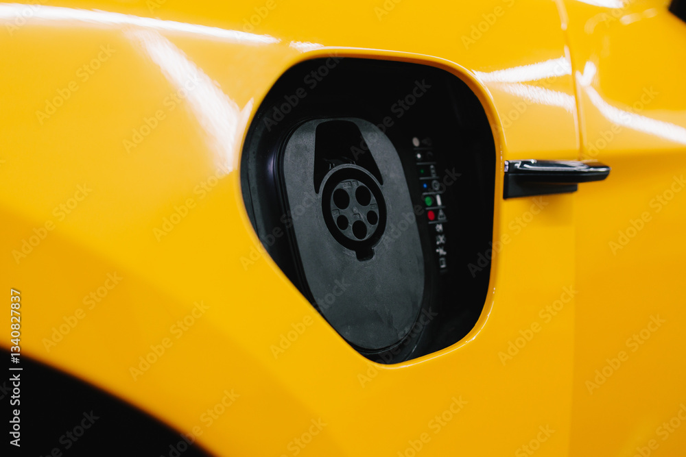 EV Charging port of electric car. Black circular inlet with multi-pin ...