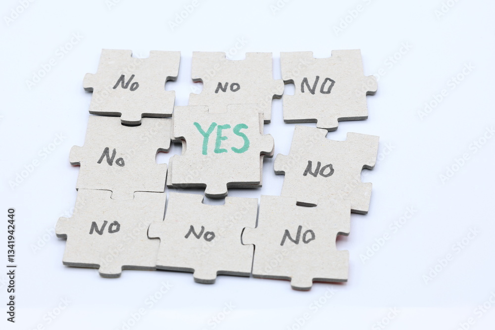 Puzzle pieces. Green YES or NO written in large capitals. Stock Photo ...